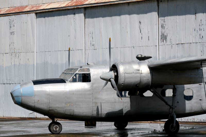 Light Twin-engine Aircraft in Front of Hangar Stock Photo - Image of ...