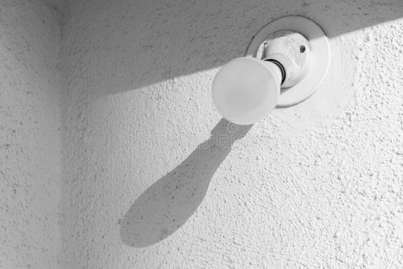 Light of White Bulb on White Textured Wall Stock Image - Image of light ...