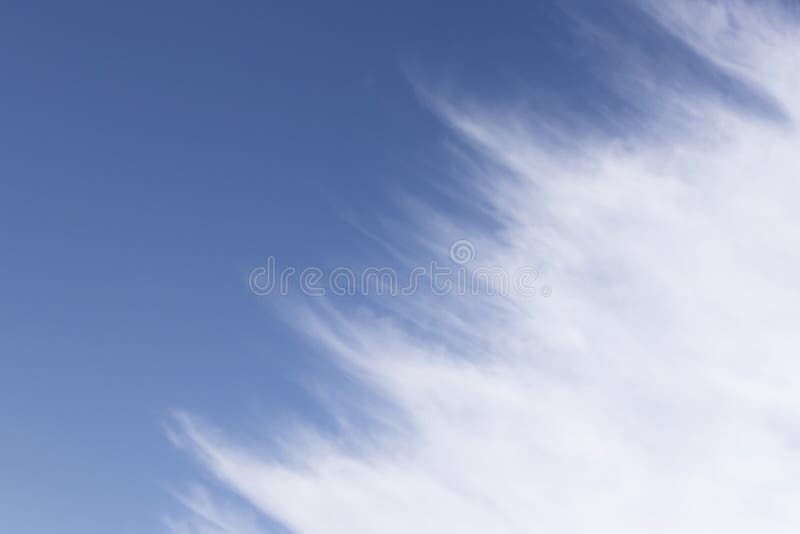 Light White Cloud with Torn Edges Floats in Blue Sky Stock Image ...