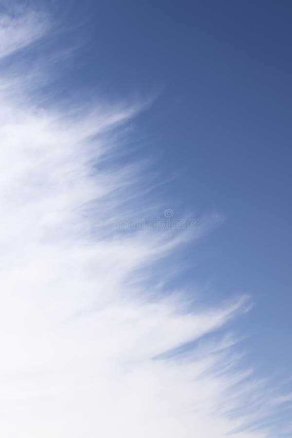 Light White Cloud with Torn Edges Floats in Blue Sky. Stock Photo ...