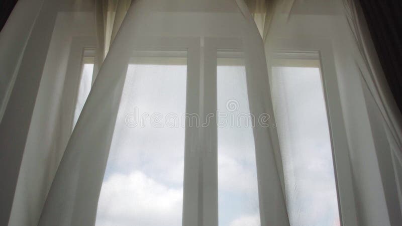 Light Wind Blows through Open Window and Waves Curtains Stock Video ...