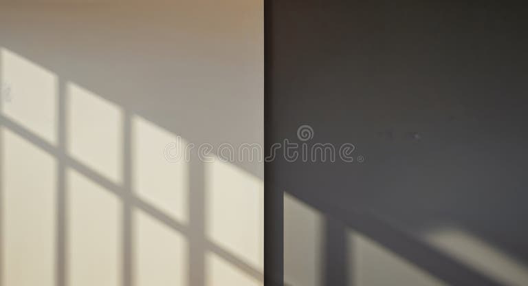Light from Window Casting Shadows on Split Toned Wall Stock Image ...