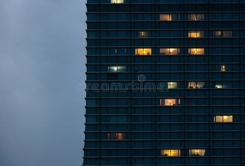 The Light of the Windows of the Office Building at Night. City ...