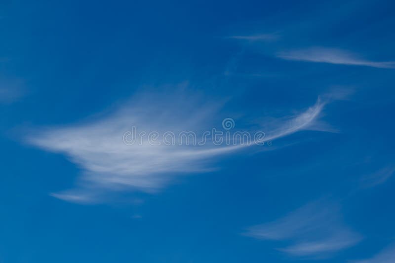 Light Wispy Clouds in the Clear Blue Sky Stock Photo - Image of blue ...