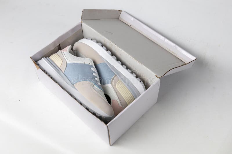 Light Women S Sneakers in a Box on a White Background Stock Photo ...