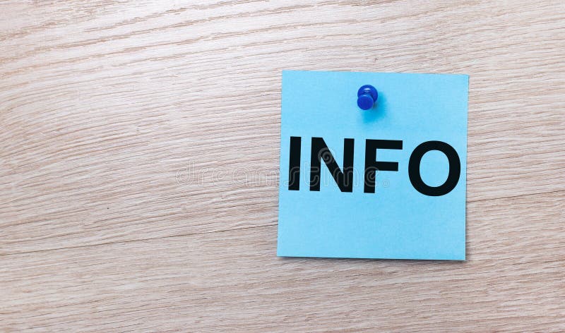 On a Light Wooden Background - a Light Blue Square Sticker with the ...