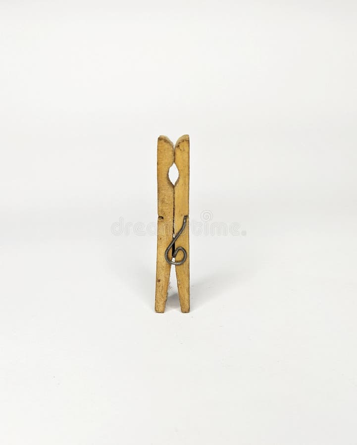 Light Wooden Clothespin Standing Balanced on a White Floor Stock Image ...