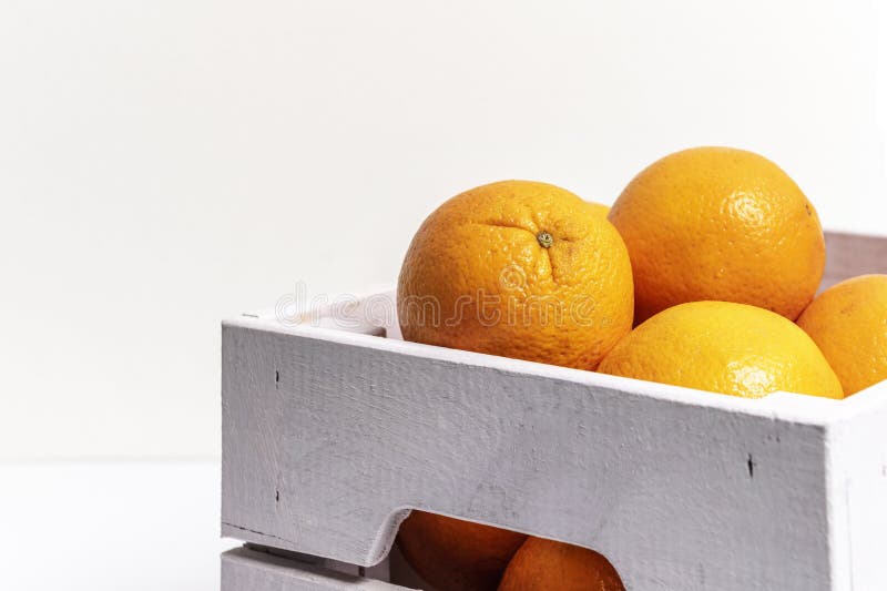 Light Wooden Fruit Box Full of Oranges for Making Juice on a White ...