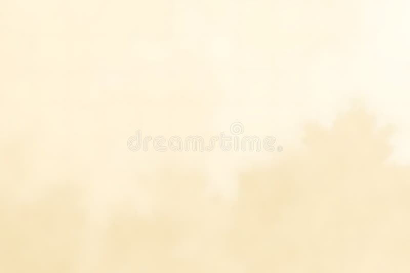 A Light Yellow Background with Soft, Cloudy Formations Evokes Warmth ...