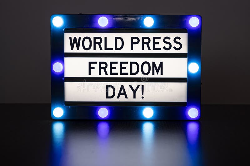 Lightbox with Blue Lights in Dark Room with Words - World Press Freedom ...