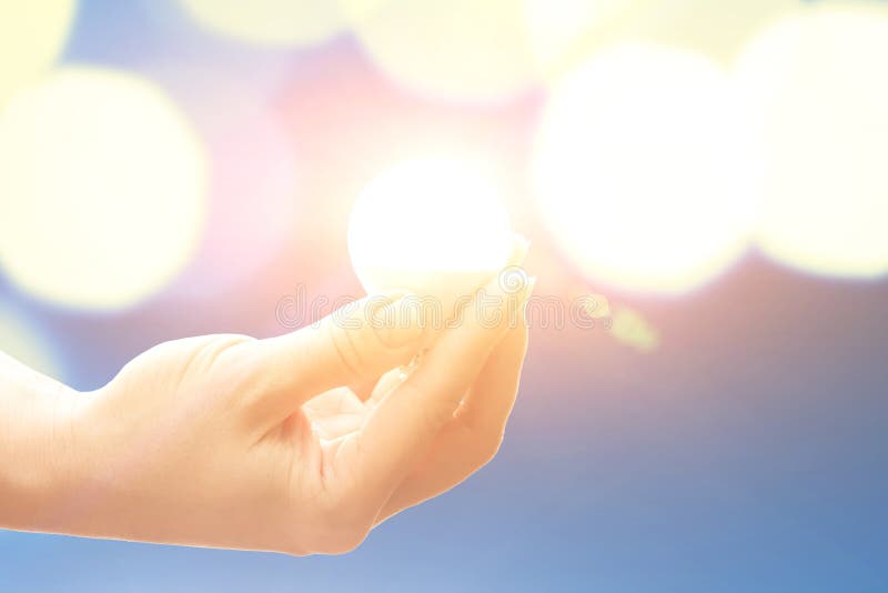 Lightbulb Glowing with Bright Light,illuminates Background with ...