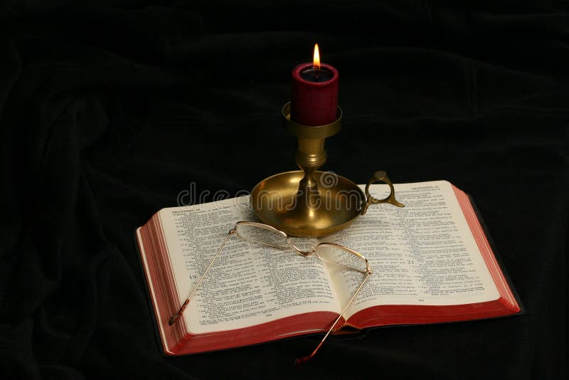 Lighted Candle on Open Bible -- Whole Bible Visible Stock Photo - Image ...