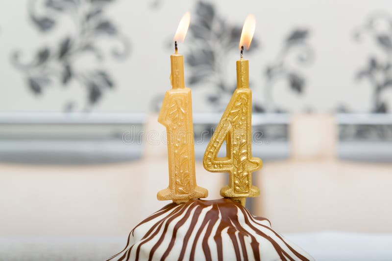 Lighted Candles on Cake with the Number 14 Stock Image - Image of ...