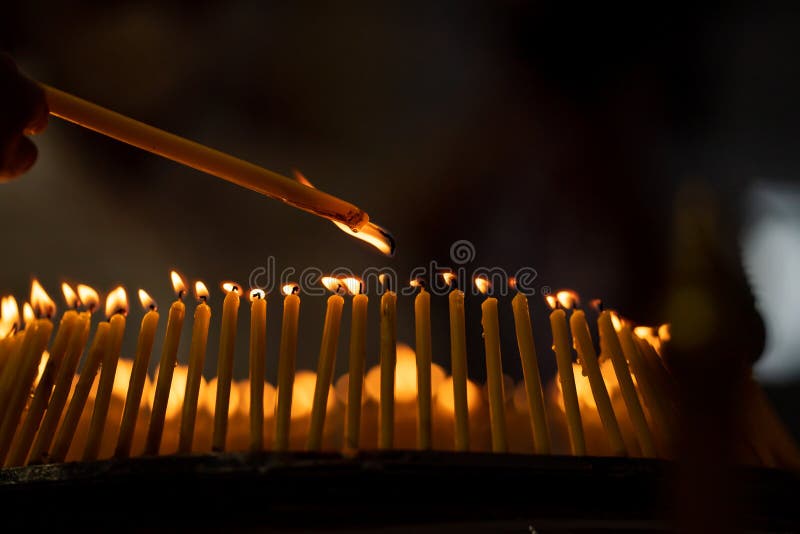 Lighted Candles Laid Out in Circle in the Dark with Small White Shadow ...