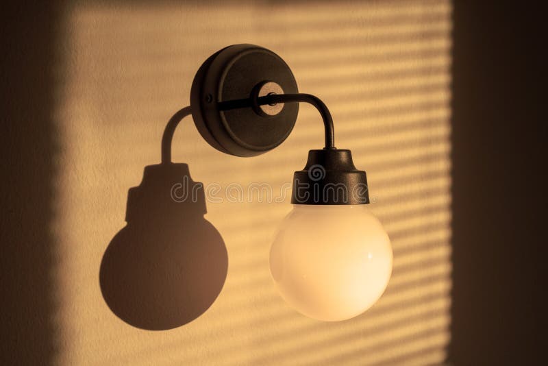 Lighted Classic Sconce of Round Shape on the Wall, with Soft Light and ...
