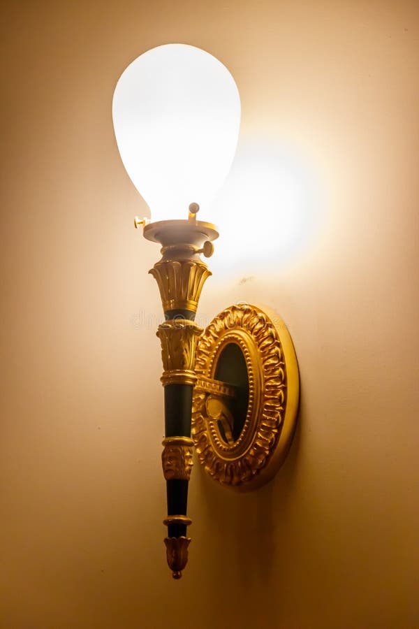 Lighted Classic Sconce on Wall Stock Photo - Image of design, elegant ...
