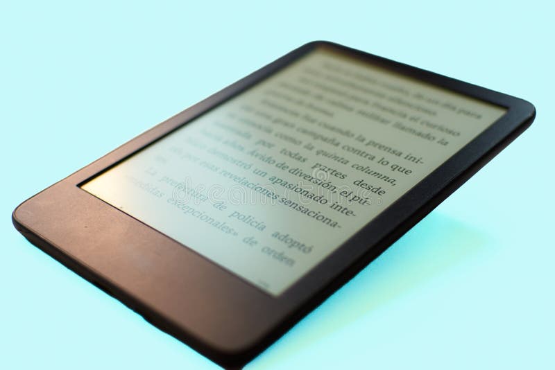 Lighted E-book Resting on a Table Stock Image - Image of electronic ...