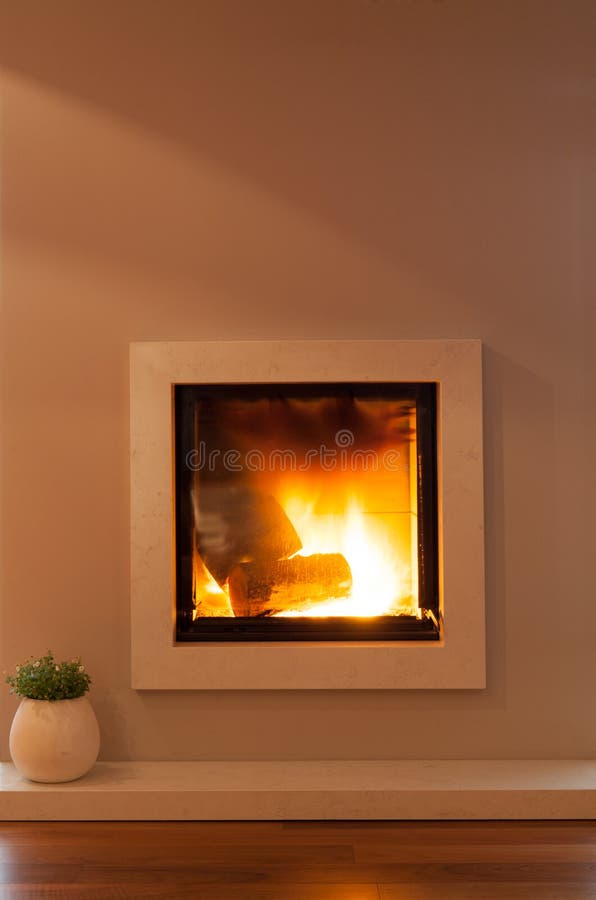 Lighted fireplace stock image. Image of expensive, cozy - 54129163