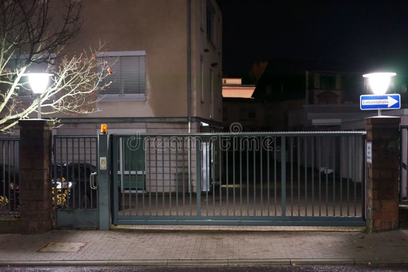 Lighted Gate Entrance at Night Stock Photo - Image of gate, night ...