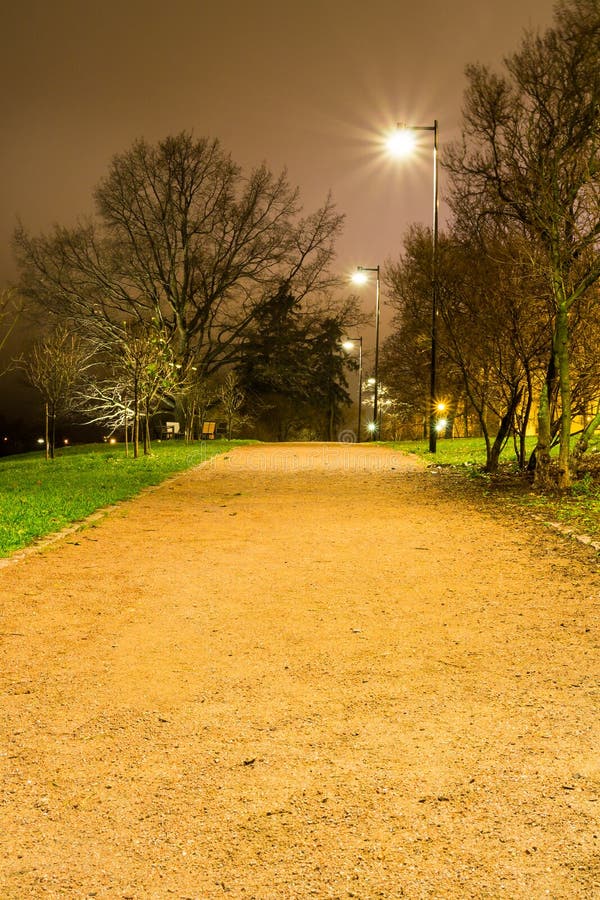 Lighted Gravel Path in the Park Stock Photo - Image of city, dirt: 46874990