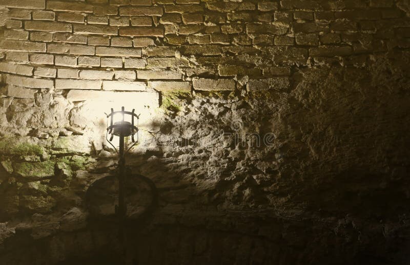 Lighted Medieval Castle Torch Hanging on a Stone Wall, Vintage Objects ...