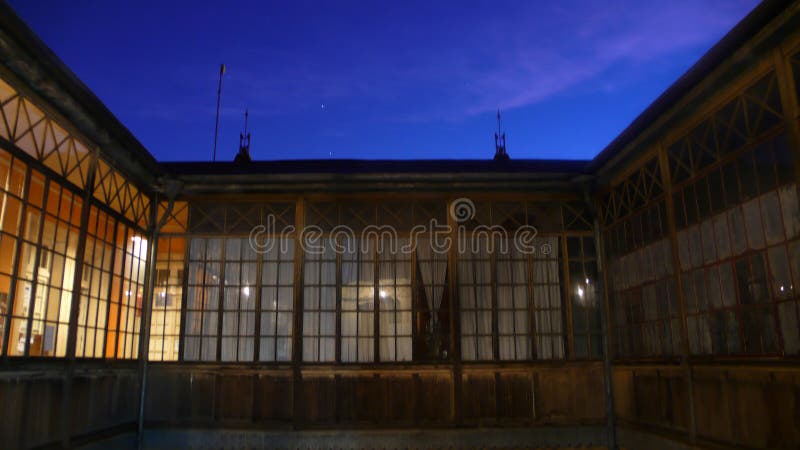 Lighted Windows on Old House Blue Dark Sky Stock Image - Image of moody ...