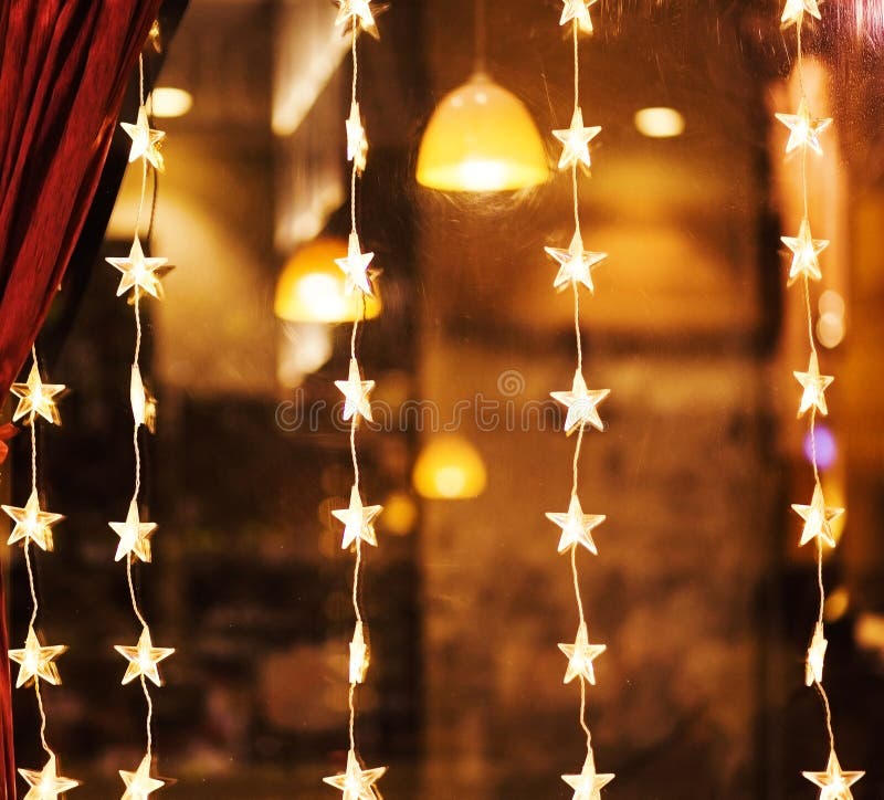 Lightening Christmas Stars Hanging on a String Stock Photo - Image of ...