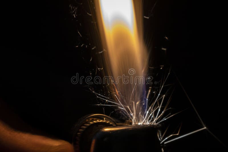 A Lighter Being Lit in the Dark Stock Image - Image of quartz, geology ...