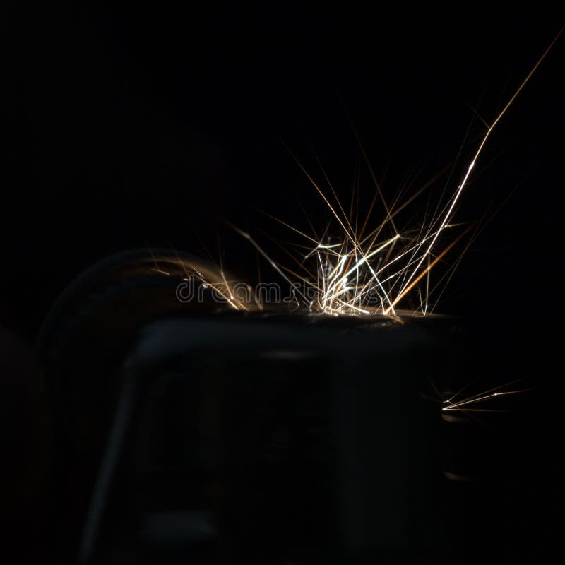 A Lighter Being Lit in the Dark Stock Image - Image of cool, heal ...