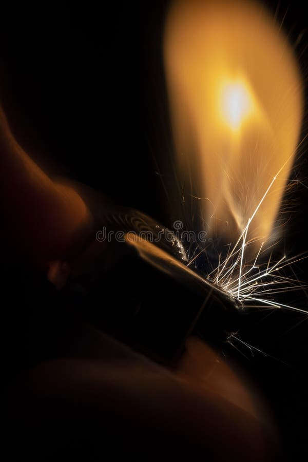 A Lighter Being Lit in the Dark Stock Image - Image of candle, closeup ...