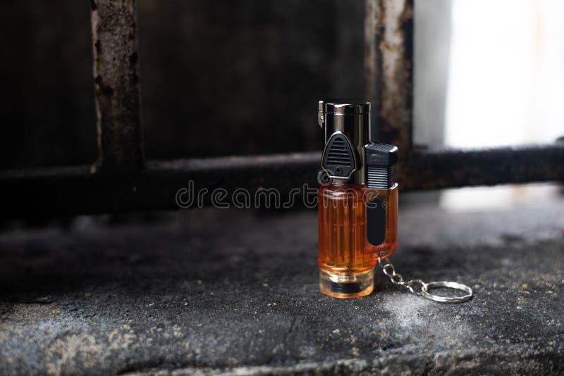 The Lighter, Flamethrower, for Burning Orange-brown Bottles Placed on ...