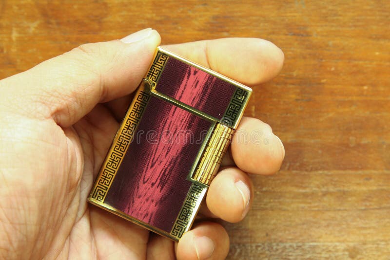 Lighter on the hand. stock image. Image of likeness, focus - 52586367