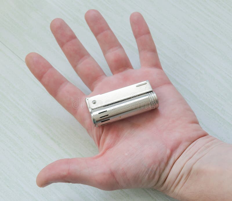 Lighter in man`s hand stock image. Image of flicker, hold - 95678063