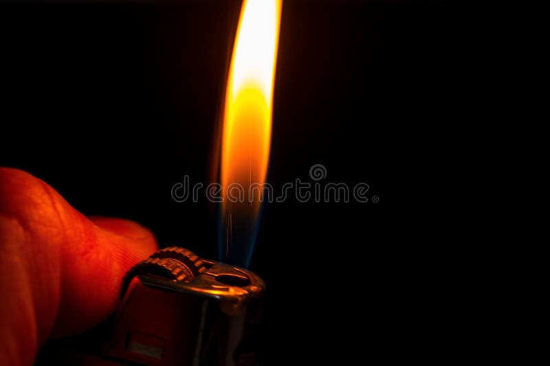 The Lighter Produces a Spark, Creating Fire. Symbol of Danger ...