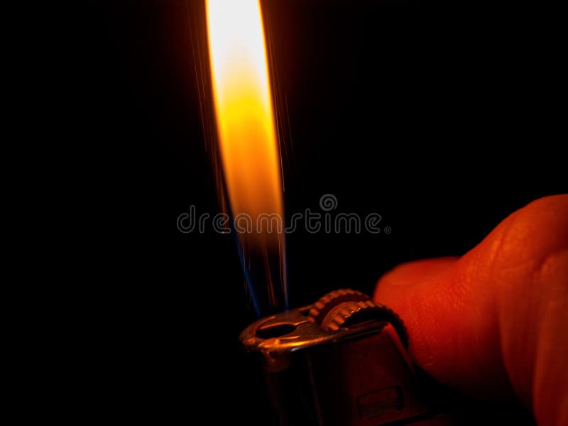 The Lighter Produces a Spark, Creating Fire. Symbol of Danger ...