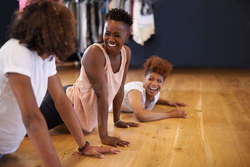 The Lighter Side of Getting Limber. Shot of a Group of Young Dancers ...