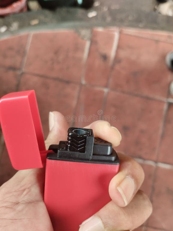 Lighters in hand stock image. Image of lighters, hand - 296236705