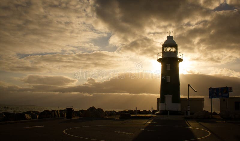 Lighthouse stock image. Image of rocks, clouds, tower - 22049275