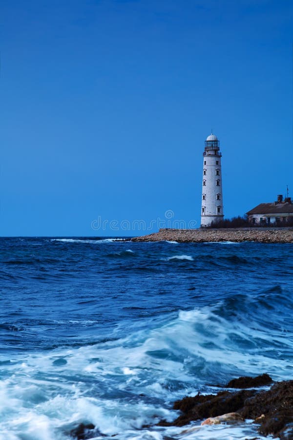 Lighthouse on the coast stock photo. Image of background - 25522066