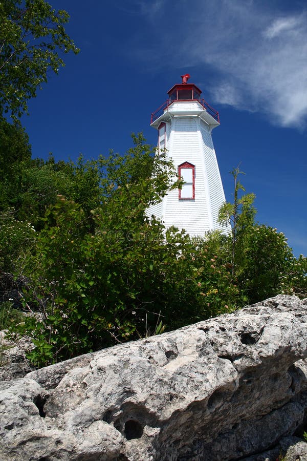 Lighthouse stock photo. Image of blue, clouds, peninsula - 5715916
