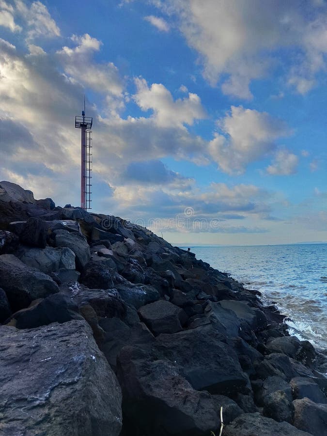 Lighthouse Above Coast Line Stock Photo - Image of contrast, beacon ...