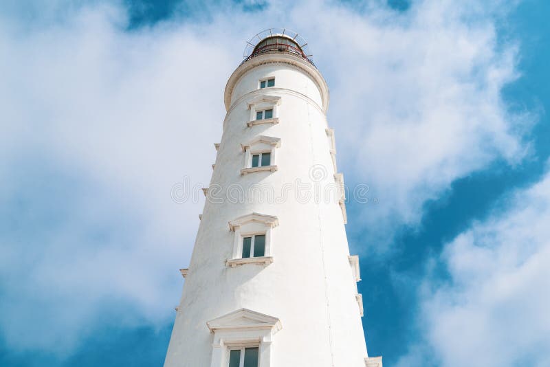 Lighthouse on a Background of Blue Sky Stock Photo - Image of beam ...