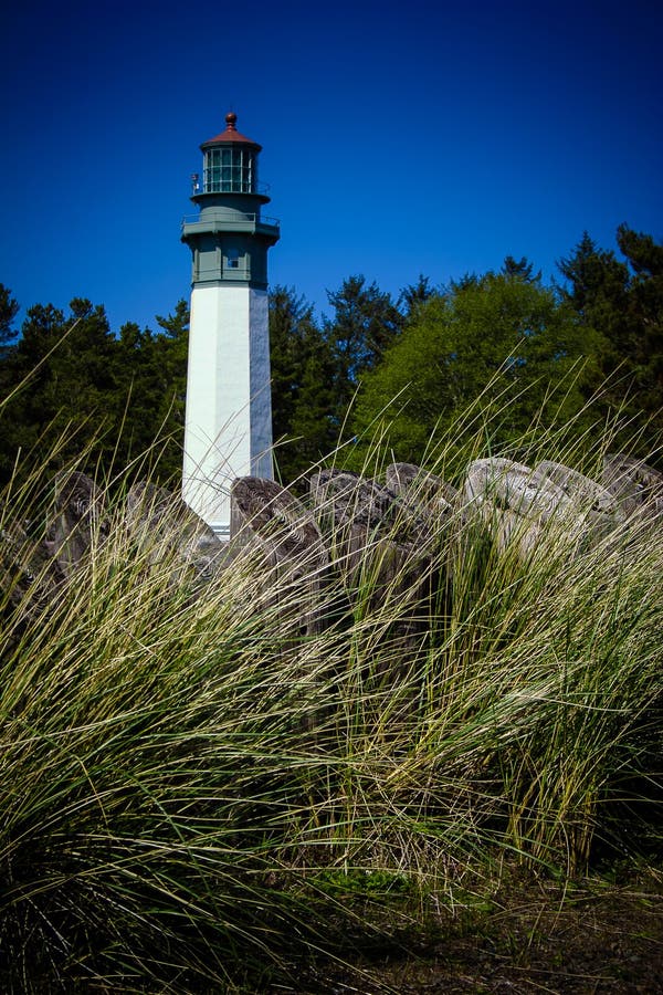 Lighthouse on beach stock photo. Image of marine, architecture - 32545324