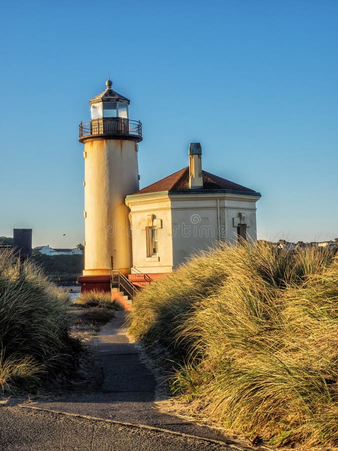 Lighthouse at beach stock photo. Image of grassy, abandoned - 45438510