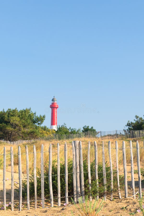 Lighthouse at the beach stock image. Image of coast, coubre - 95871105