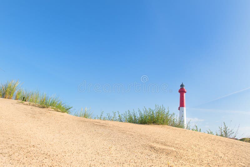 Lighthouse at the beach stock photo. Image of dunes, france - 97065680