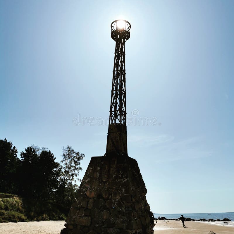 Lighthouse Beach Sand Sea Waves Stock Photo - Image of sculpture ...