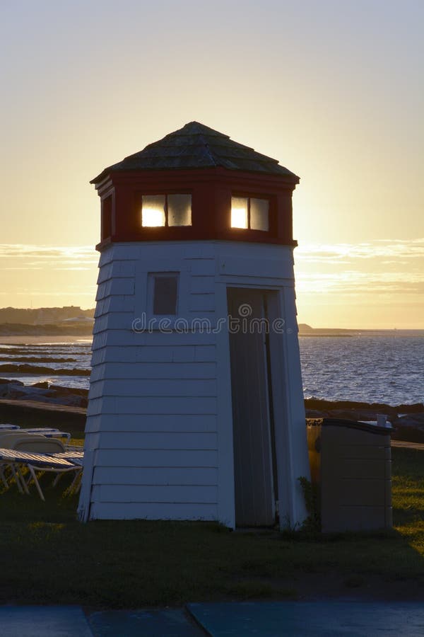 Lighthouse beach shower stock photo. Image of beach, shower - 58960828