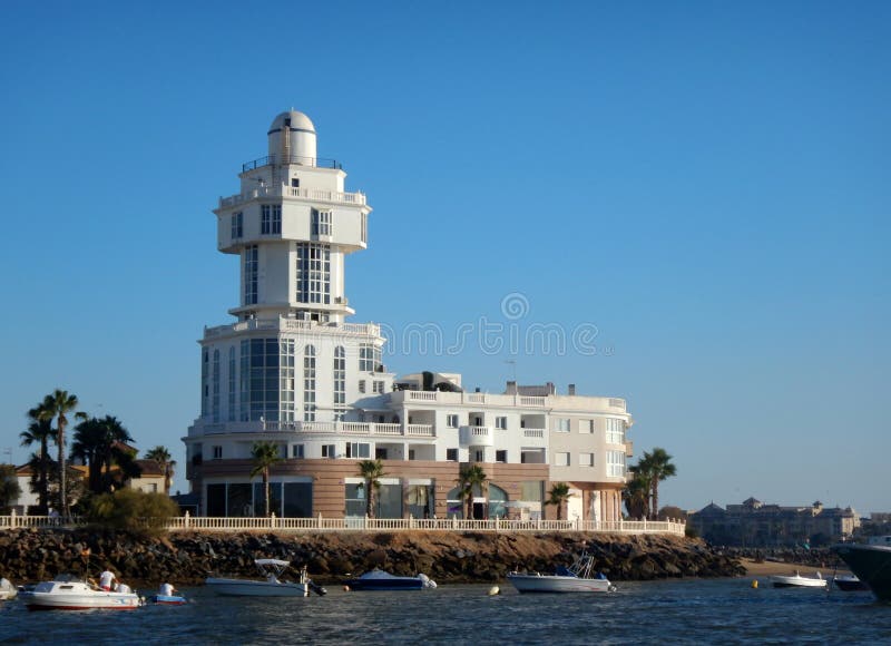 The Lighthouse on the Beach Stock Photo - Image of boulevard, building ...