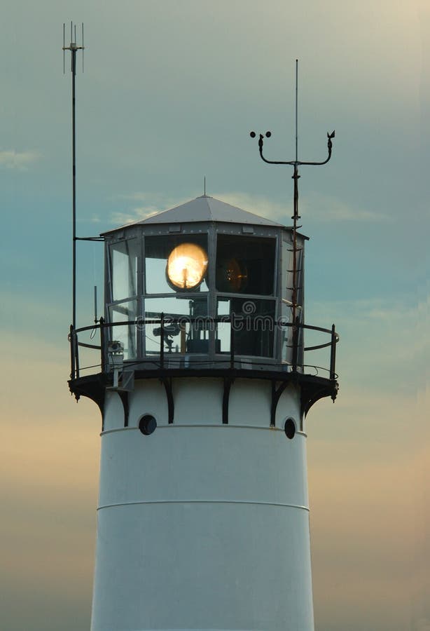 Lighthouse with Beacon Shining Stock Image - Image of clouds, light: 193213